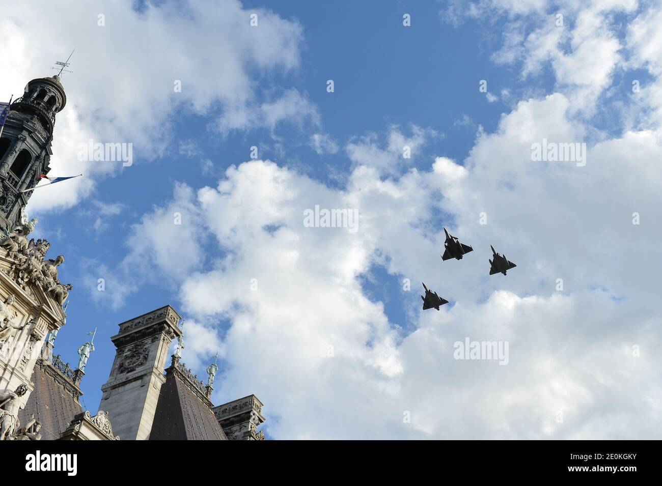 A Rafale jet fighter and 2 Mirage 2000 jet fighter of the French air ...