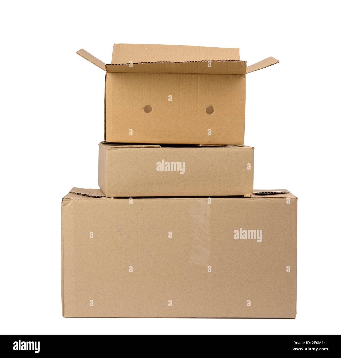 stack of closed cardboard brown paper boxes isolated on white ...