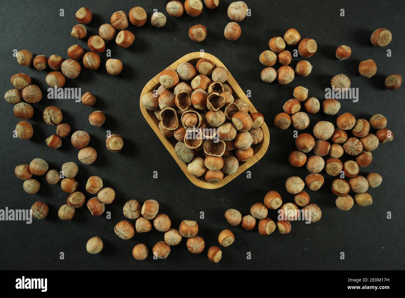 Hazelnuts on wooden backdrop. heap or stack of hazelnuts. healty food ...