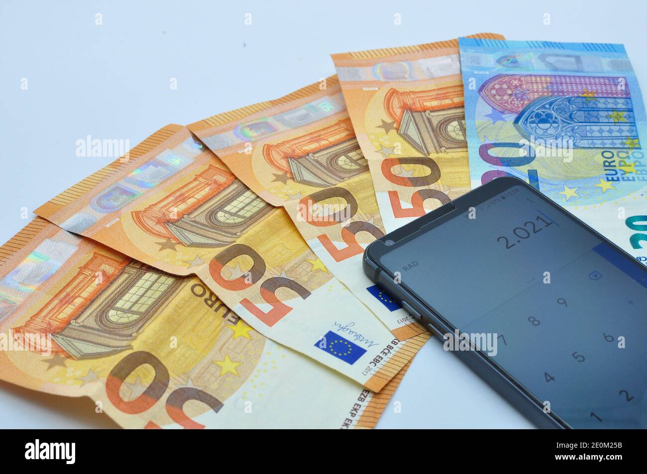 euro money with mobile phone. Conceptual photo for planning the past ...