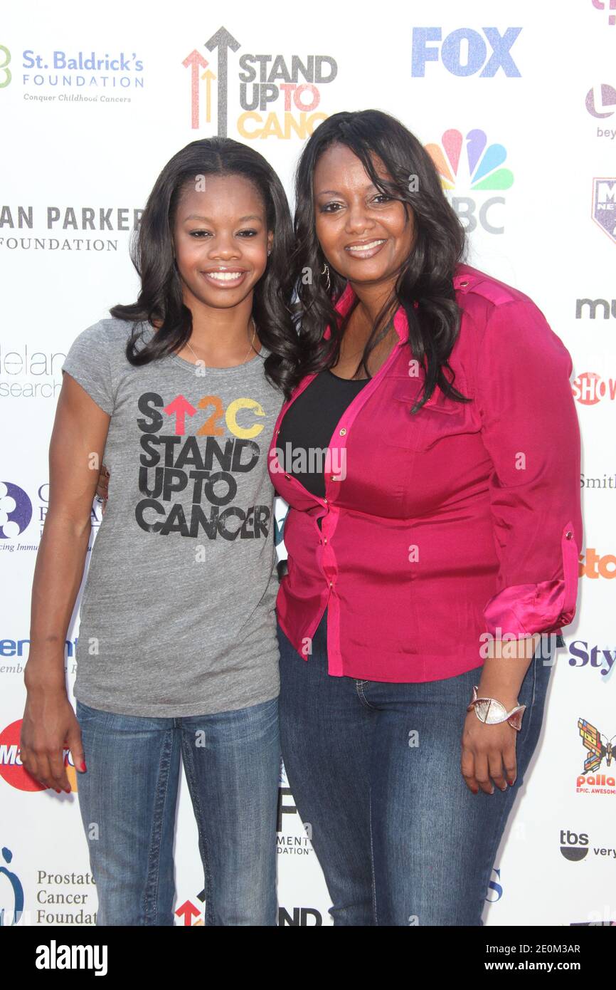 Gabby Douglas and her mother arriving at the 'Stand Up to Cancer ...