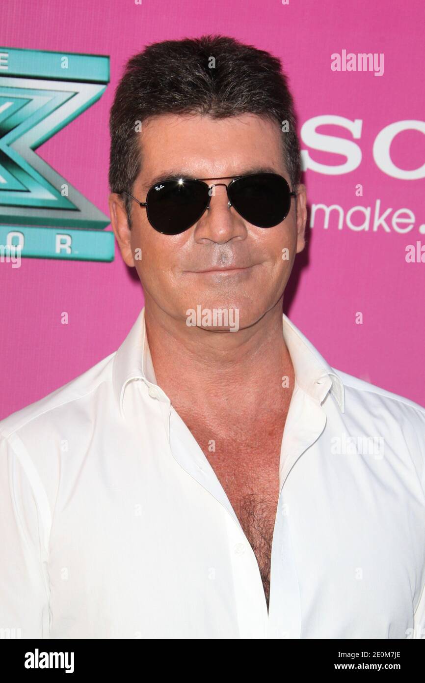 Simon Cowell arrives to the premiere of X-Factor Season Two in ...