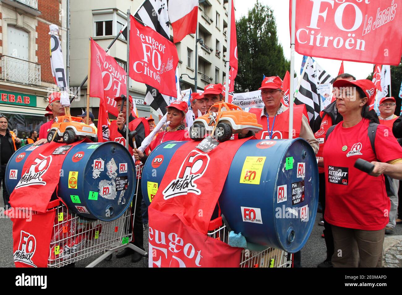 Employees of French automaker Peugeot-Citroen (PSA) protest against PSA ...