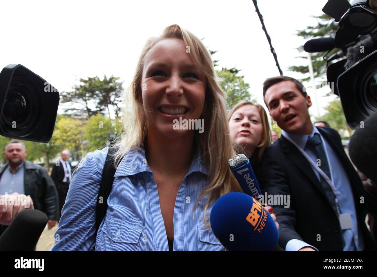FN MP Marion Marechal-Le Pen talks to the media as she arrives at the ...