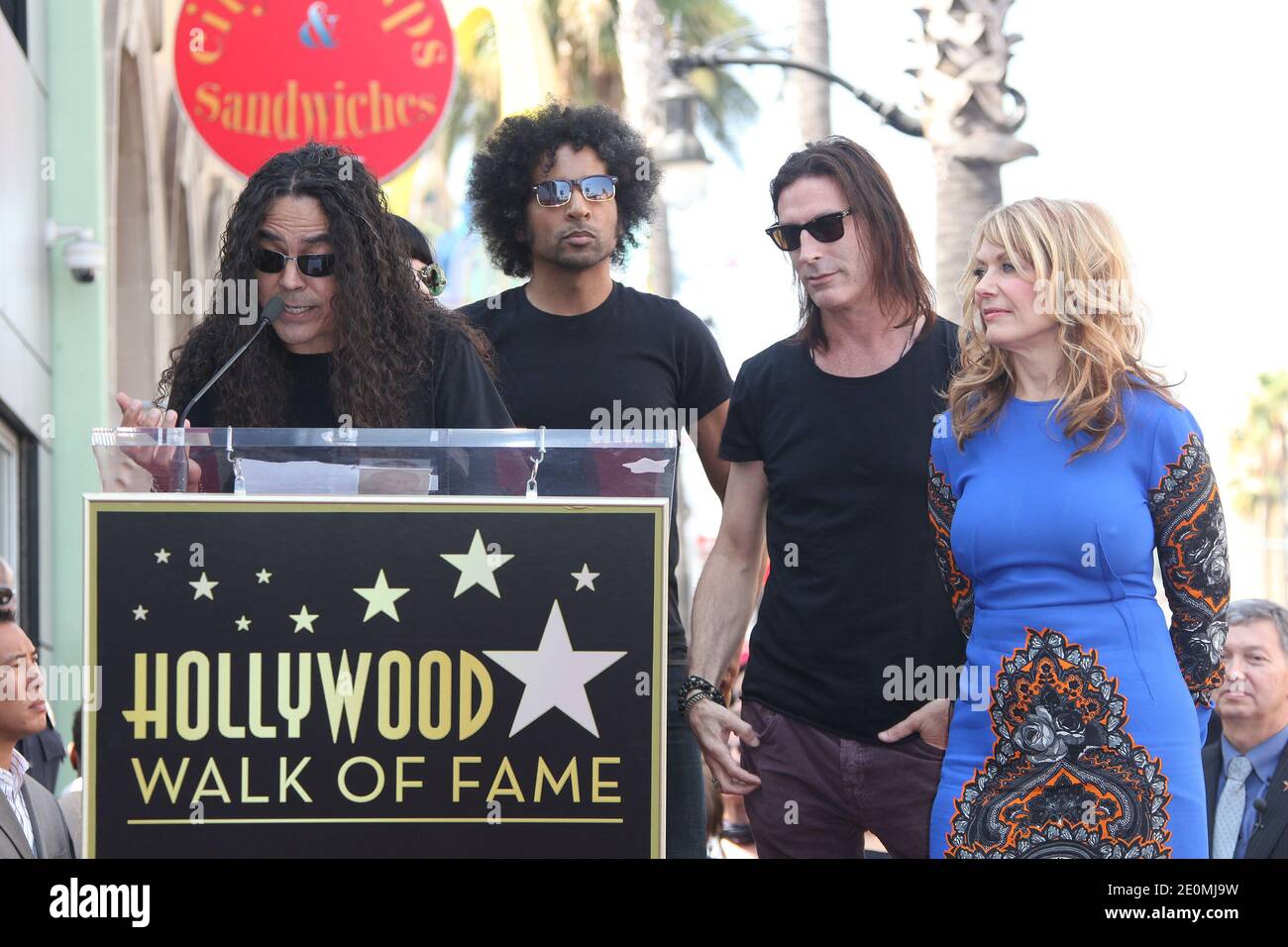 Mike Inez of Alice in Chains speaks as Ann Wilson and Nancy Wilson of ...