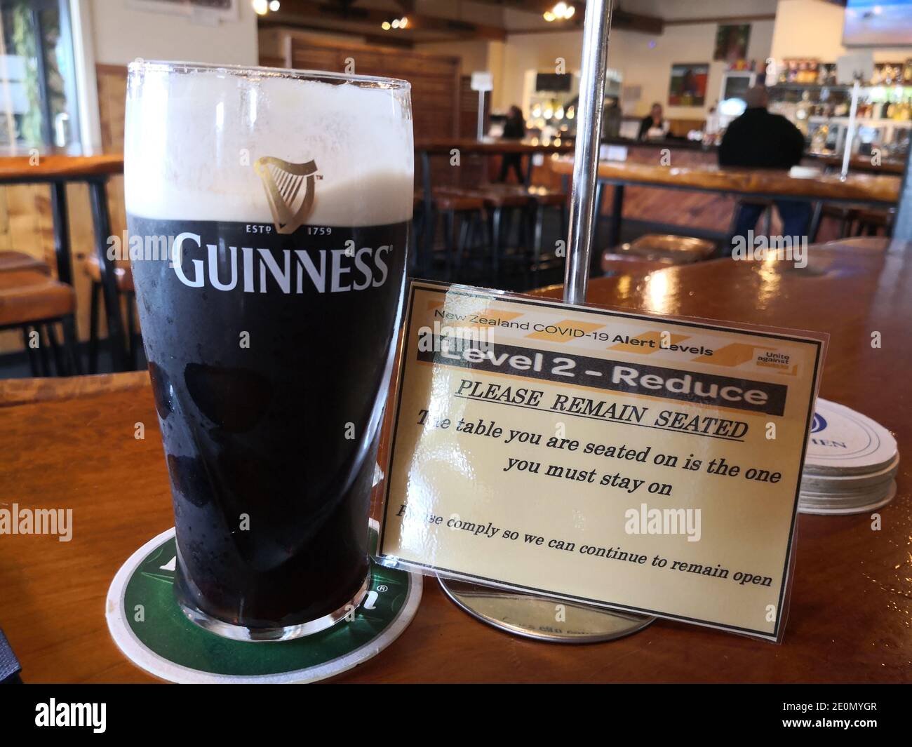 Pub Lunch, a pint of Guinness and a burger and fries Stock Photo - Alamy