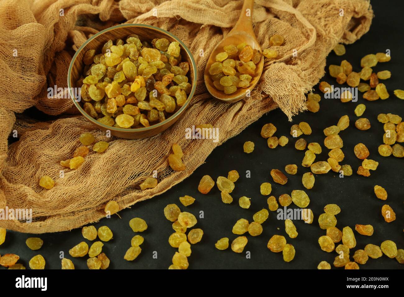 Dried raisins on white background Stock Photo - Alamy