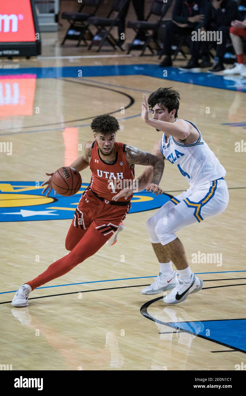 Utah Utes forward Timmy Allen (1) drives against UCLA Bruins guard ...
