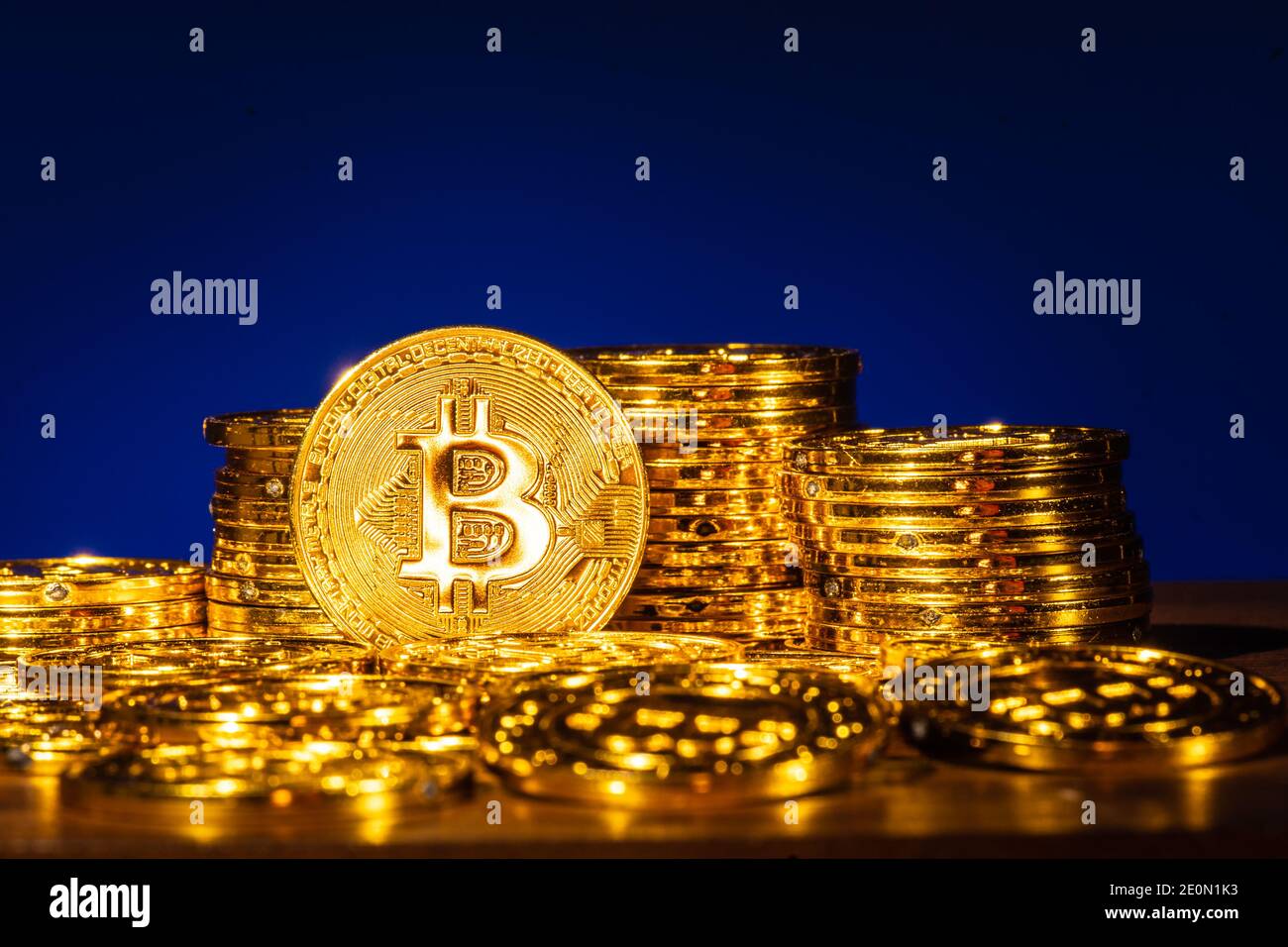 Bitcoin digital crypto currency logo in shiny gold Stock Photo - Alamy