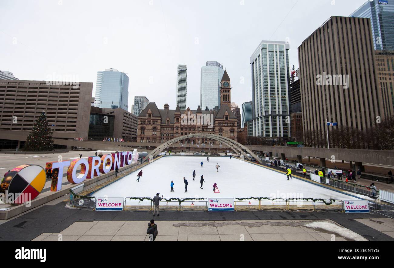 Toronto, Canada. 1st Jan, 2021. People skate on an outdoor ice rink at ...