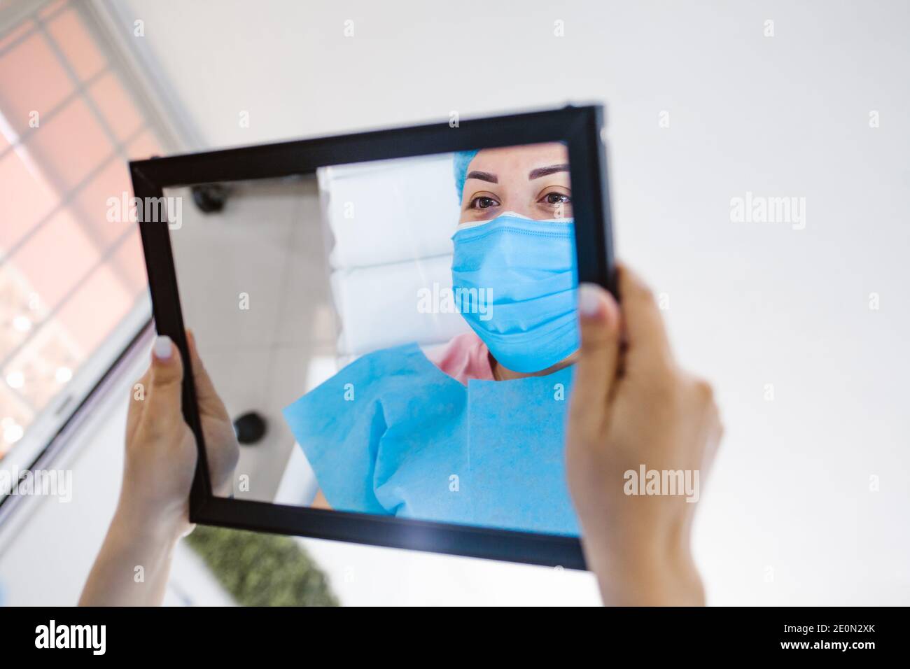 Latin woman Beautician Doing Eyebrow Tattooing For Female ...