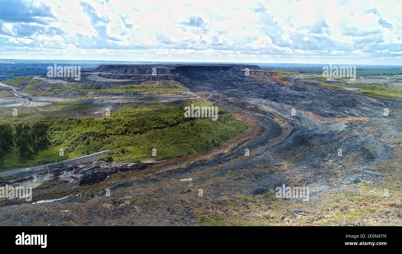 Aerial landscape with coal mine. Environmental disaster - a coal mine ...