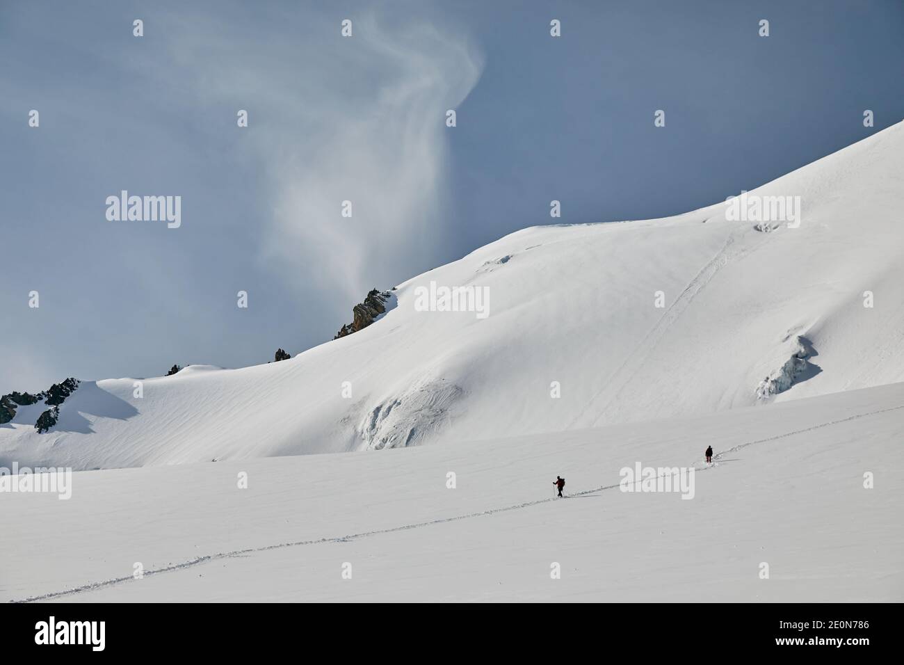 Two climbers walking on glacier Stock Photo - Alamy