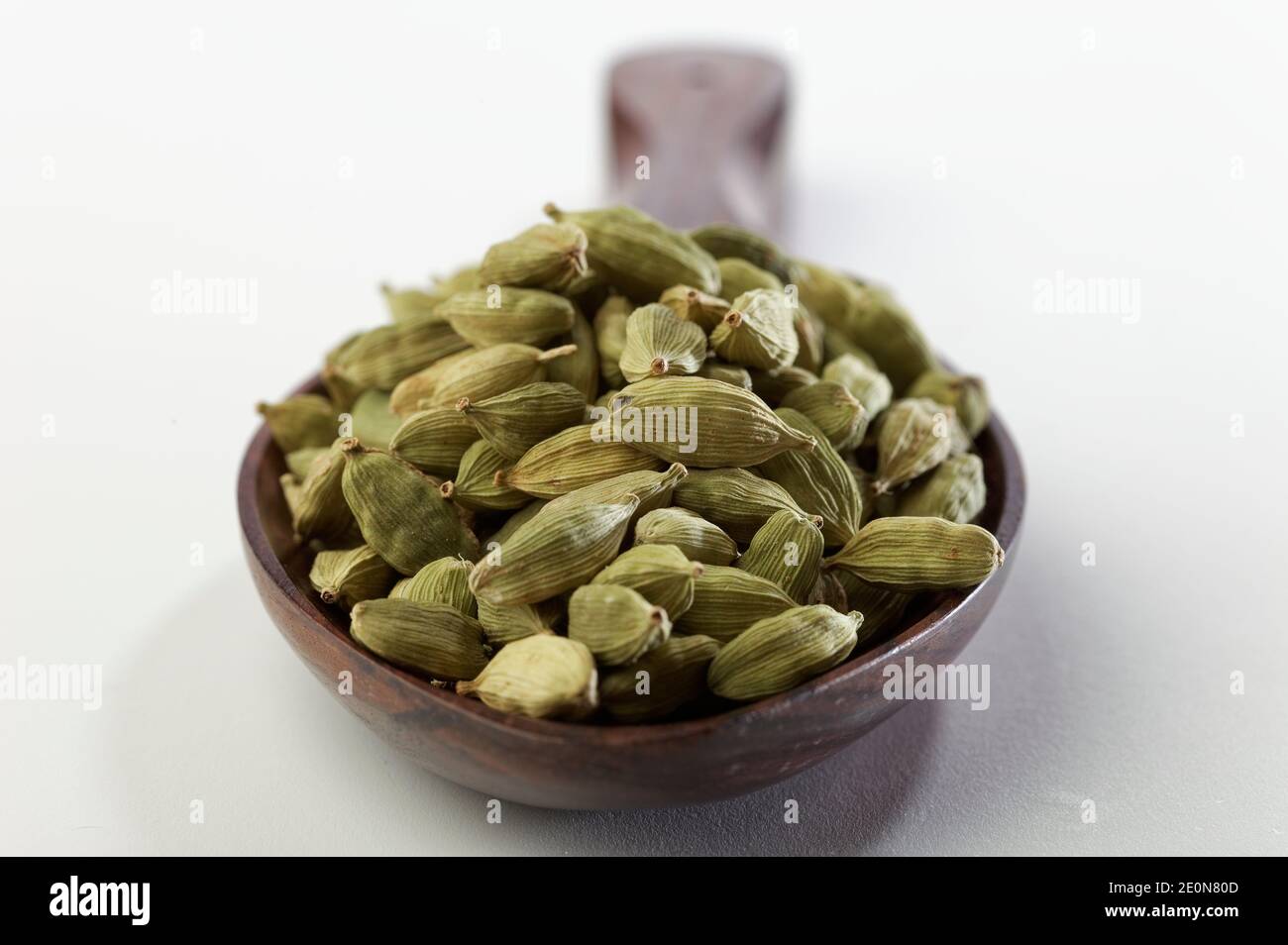 Indian spices-Cardamom small size on white background Stock Photo - Alamy