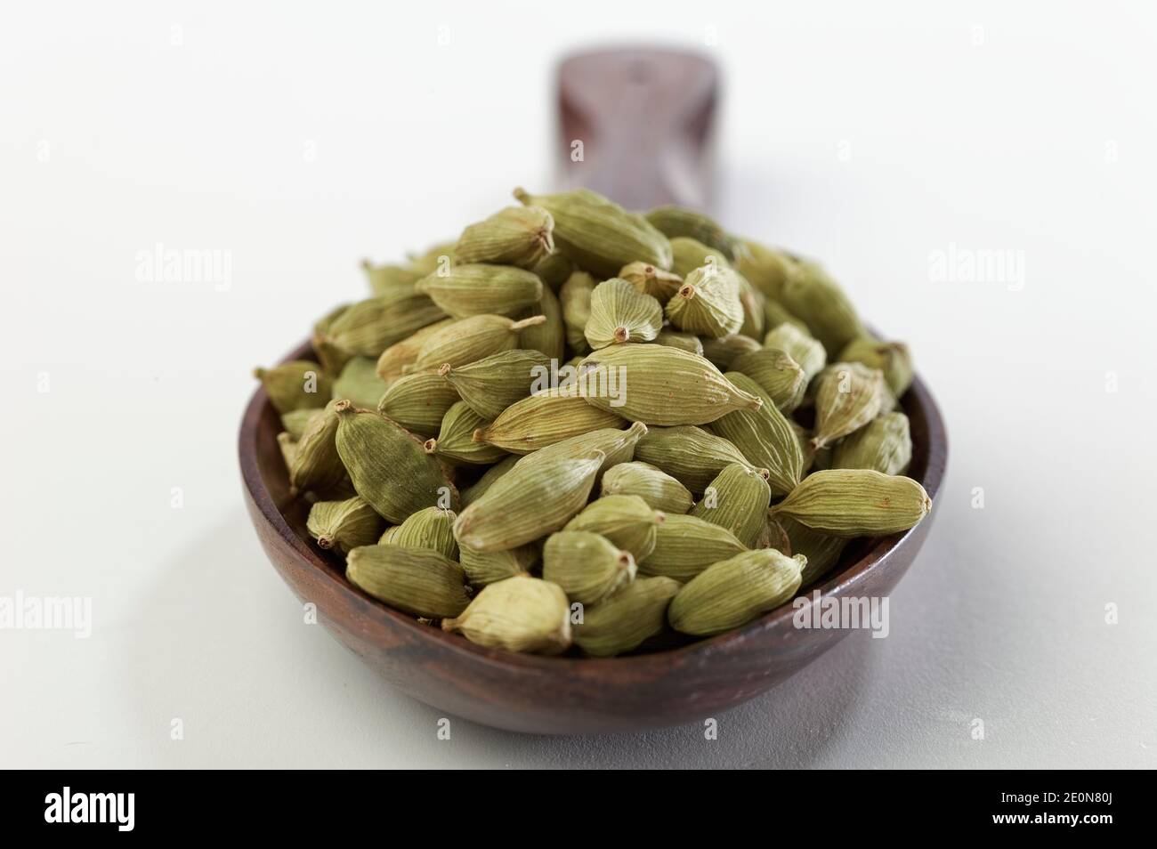 Indian spices-Cardamom small size on white background Stock Photo - Alamy