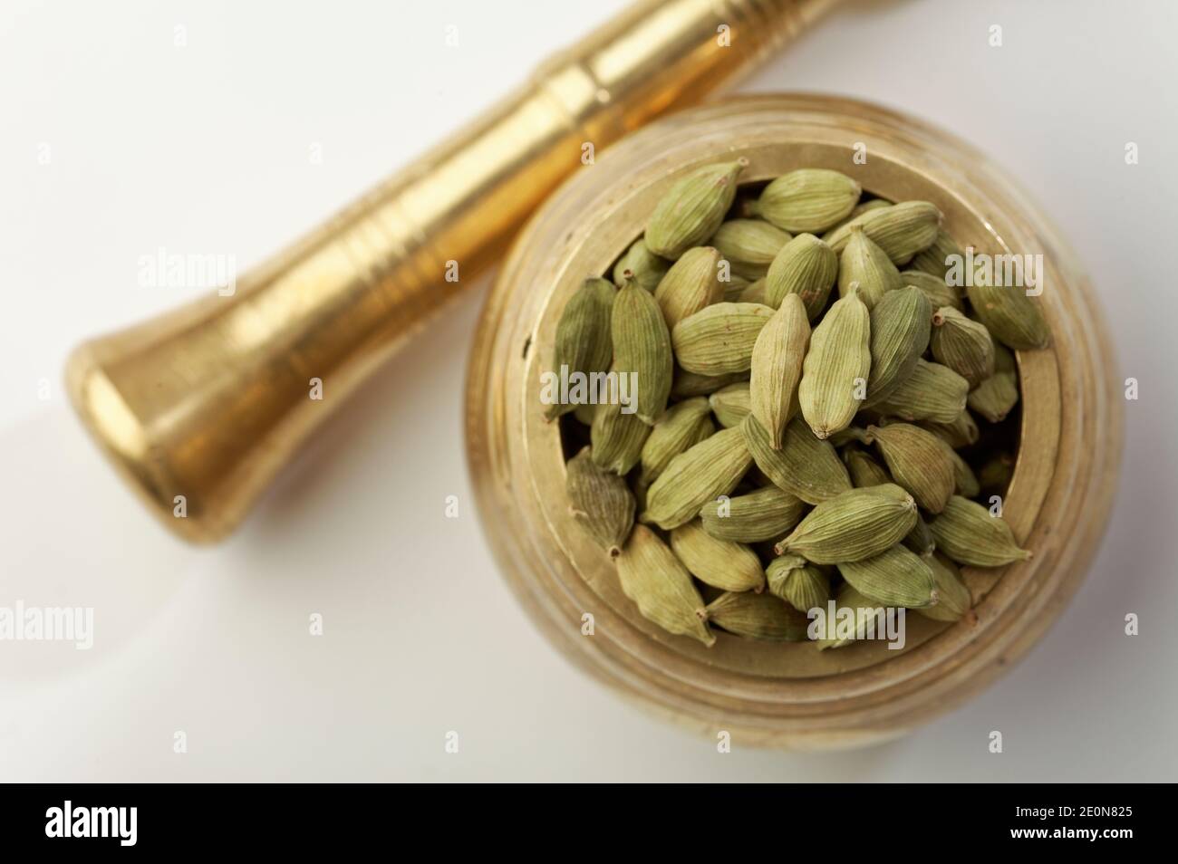 Indian spices-Cardamom small size on white background Stock Photo - Alamy
