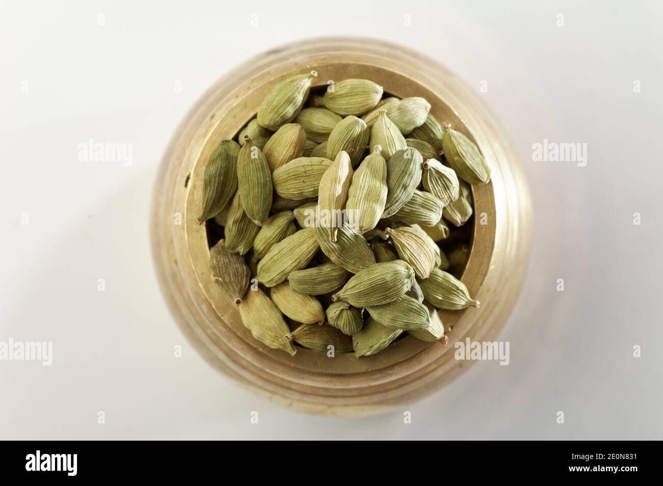 Indian spices-Cardamom small size on white background Stock Photo - Alamy