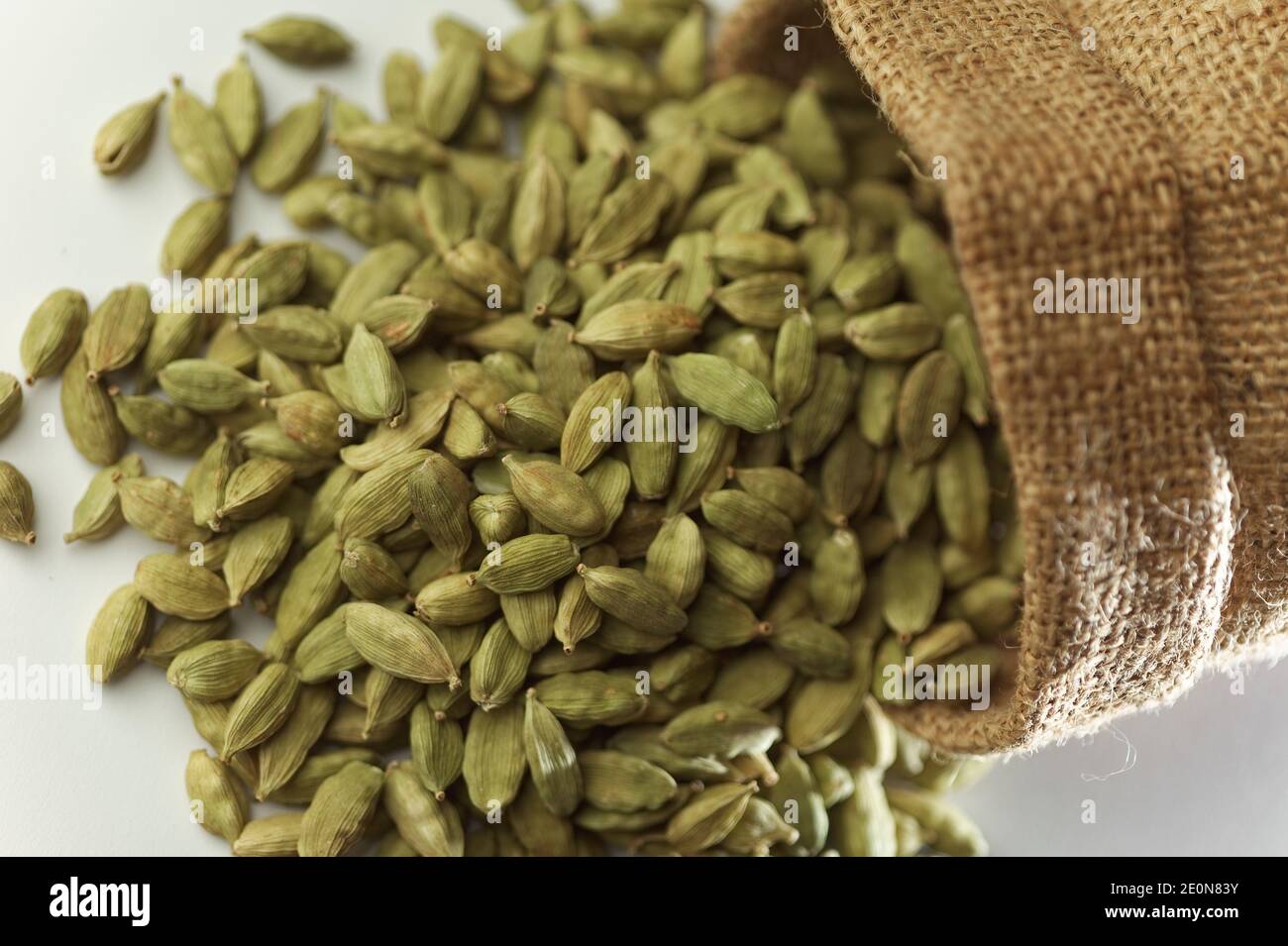 Indian spices-Cardamom small size on white background Stock Photo - Alamy