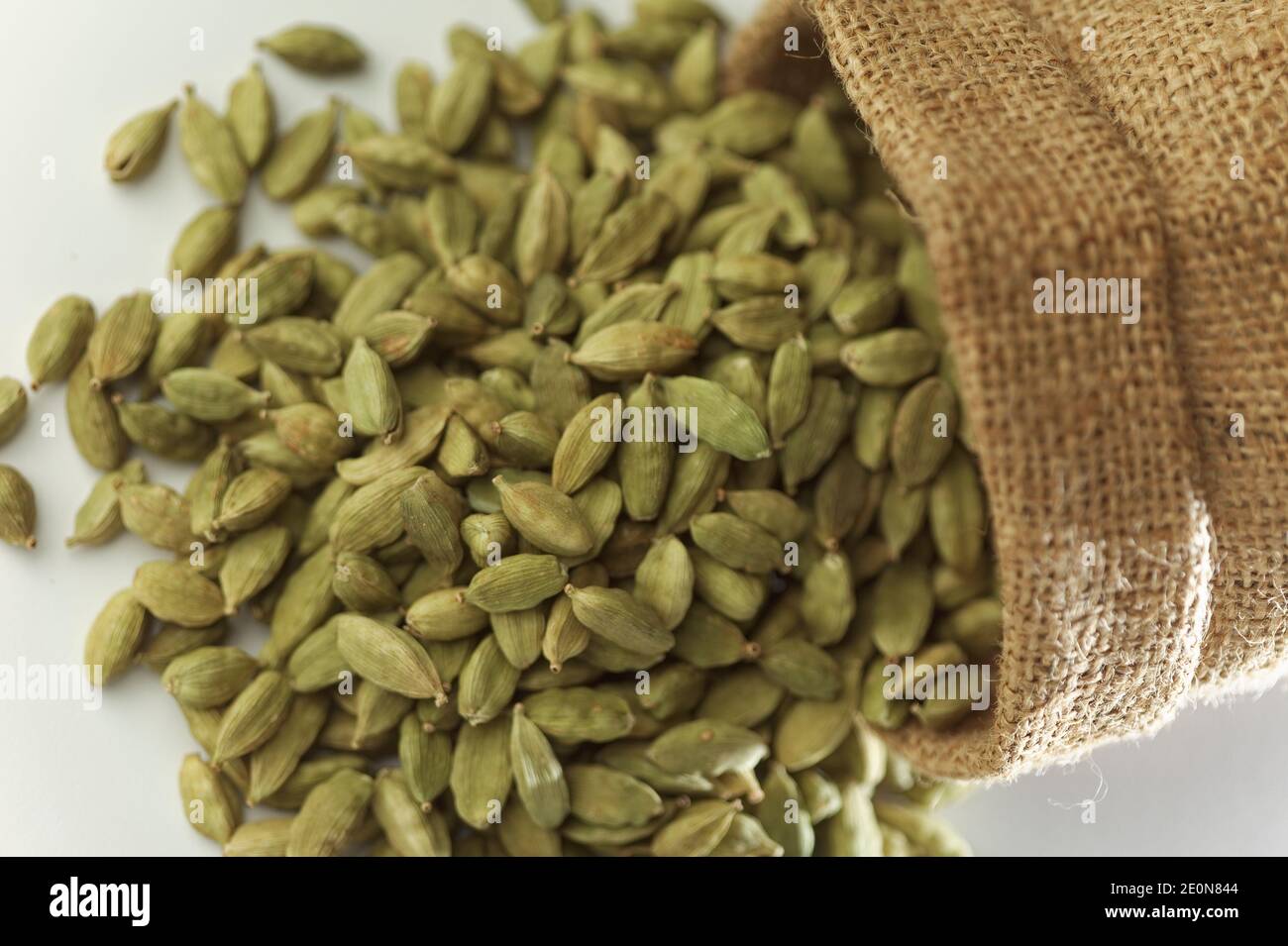 Indian spices-Cardamom small size on white background Stock Photo - Alamy