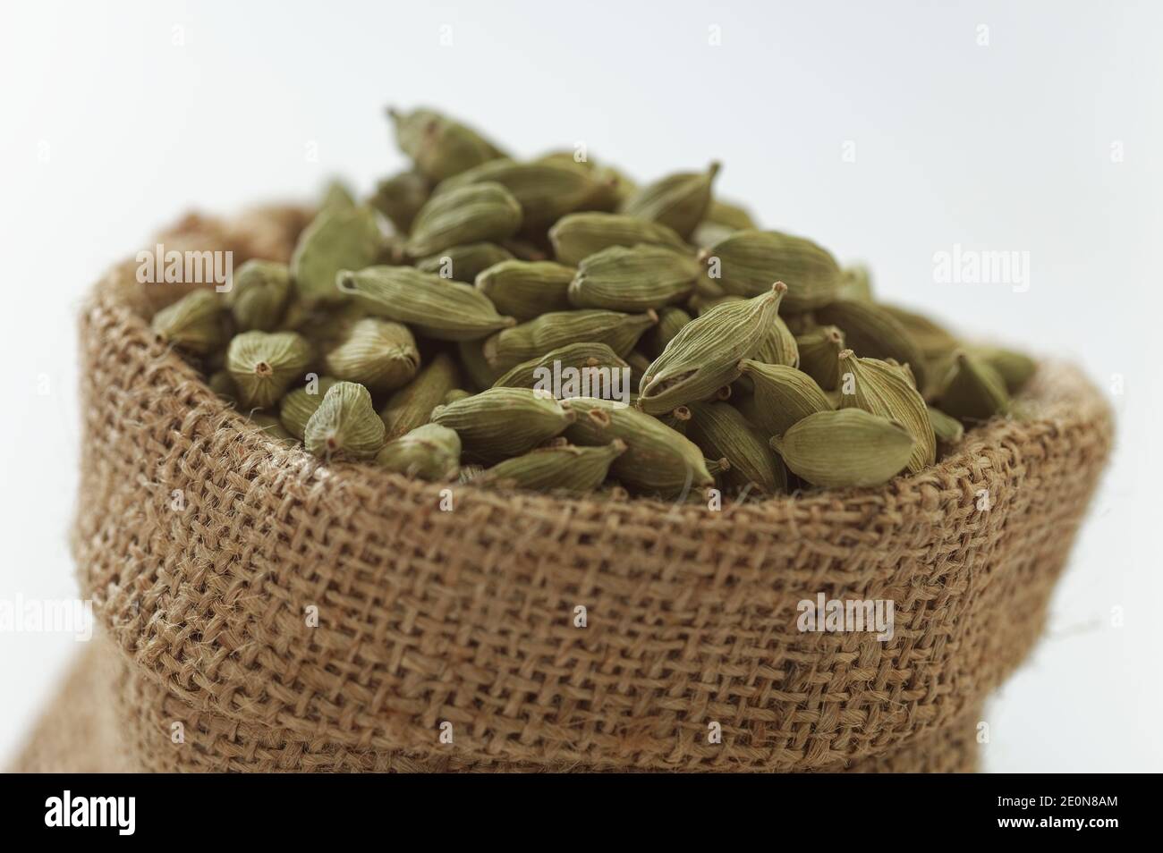 Indian spices-Cardamom small size on white background Stock Photo - Alamy