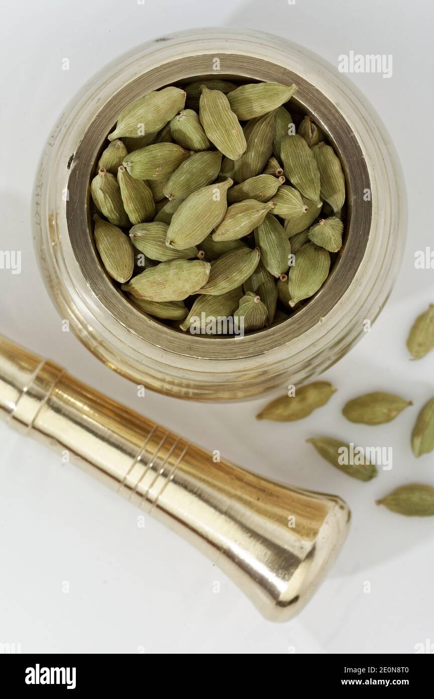 Indian spices-Cardamom small size on white background Stock Photo - Alamy