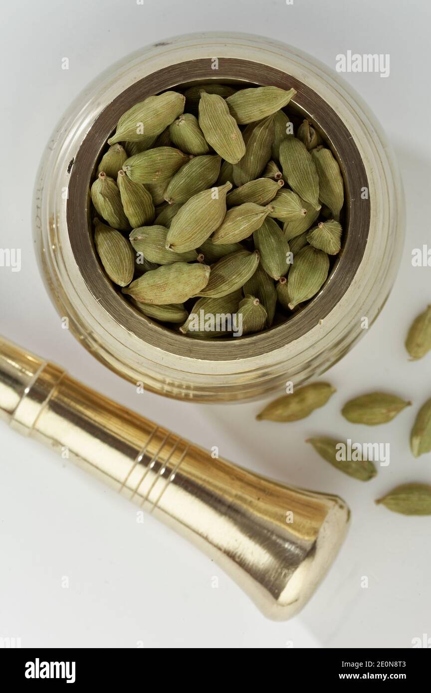 Indian spices-Cardamom small size on white background Stock Photo - Alamy