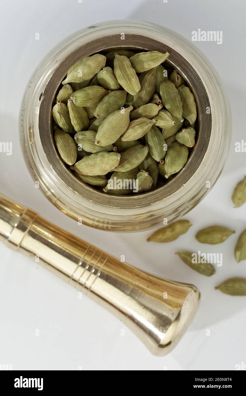 Indian spices-Cardamom small size on white background Stock Photo - Alamy
