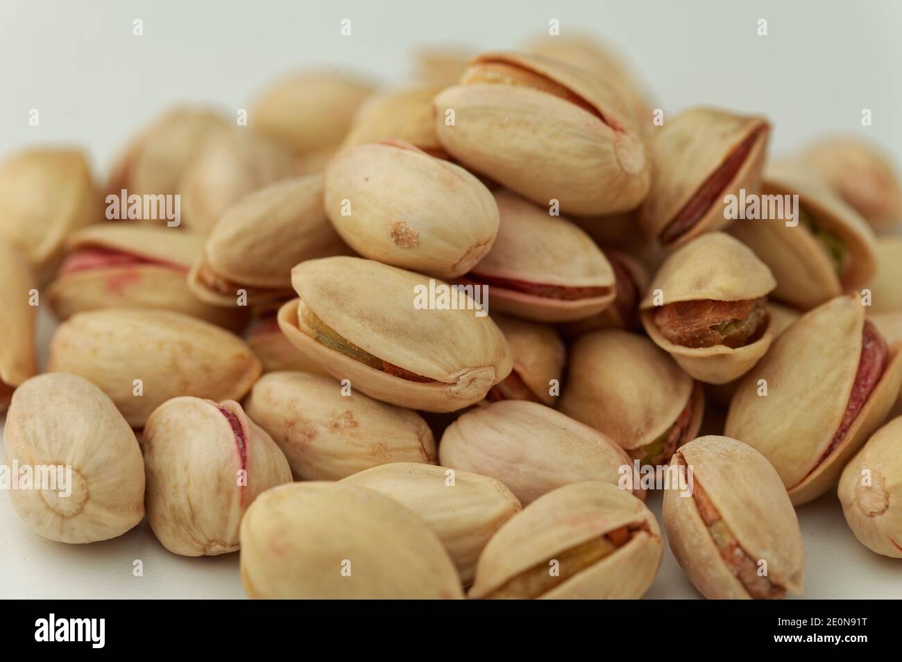 Dry fruits , pista pistachio nuts spread on white background Stock ...