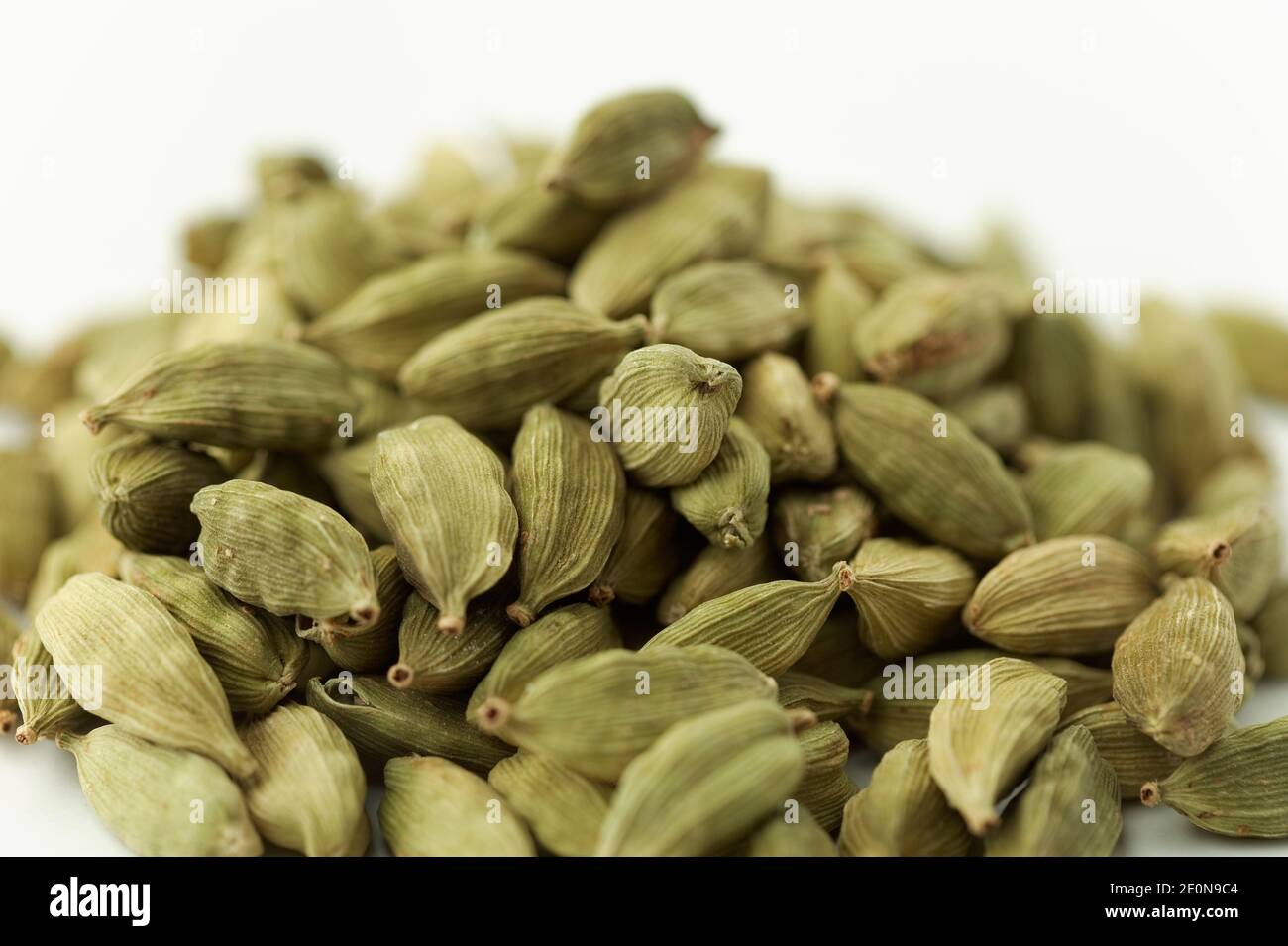 Indian spices-Cardamom small size on white background Stock Photo - Alamy
