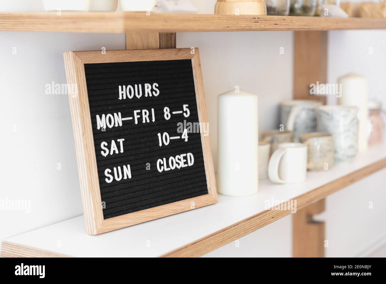 opening hours display Stock Photo - Alamy