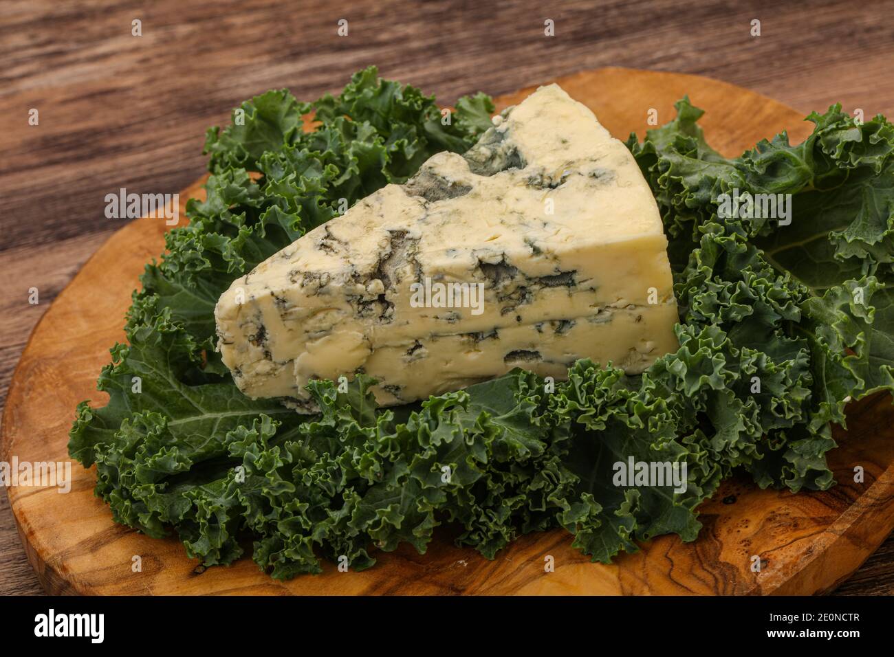 Dairy Blue cheese triangle with mold Stock Photo - Alamy