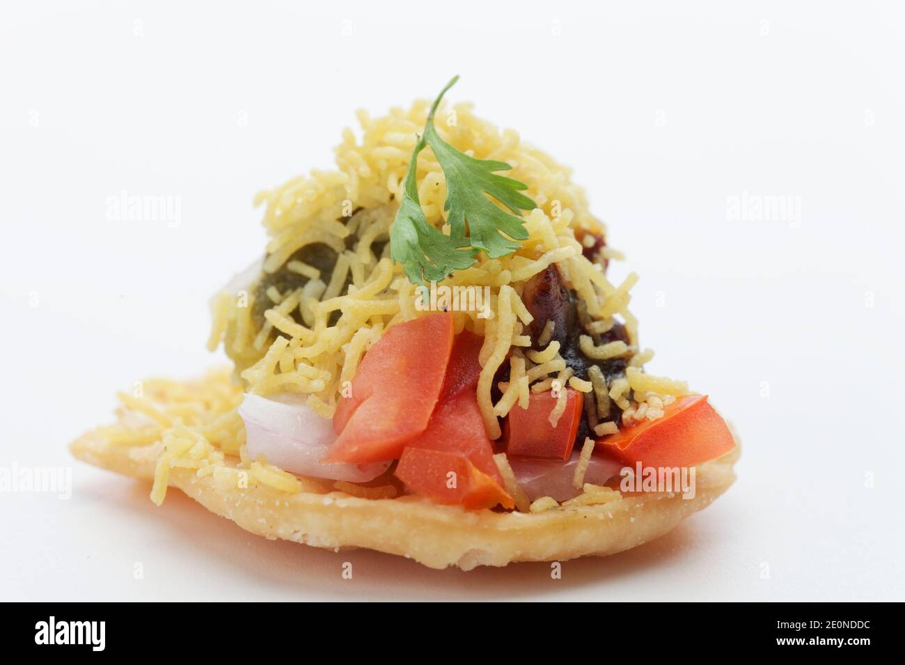 Sev Puri Fried flour (puri) topped with sev, onion,potato and other ...