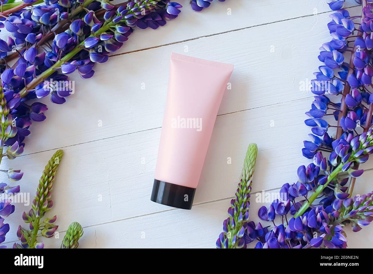 Mock-up bottle for branding and label. Lupine flowers and mockup / 3d ...