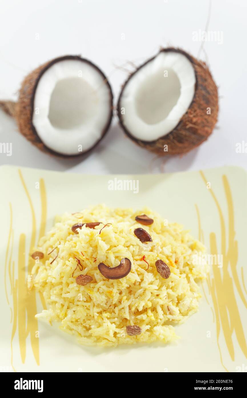 Sweet coconut rice with saffron and dry fruits Stock Photo - Alamy