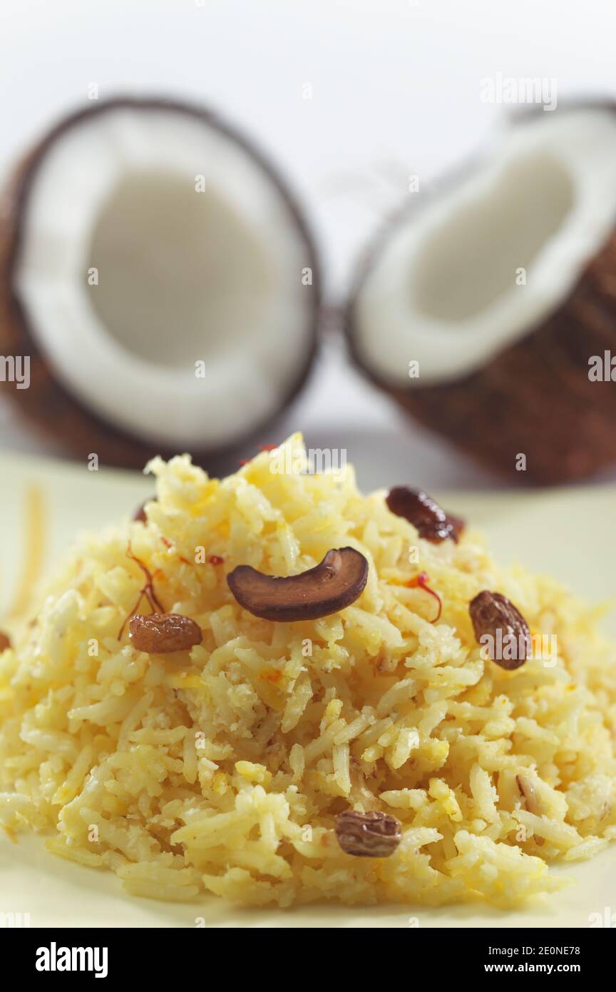 Sweet coconut rice with saffron and dry fruits Stock Photo - Alamy