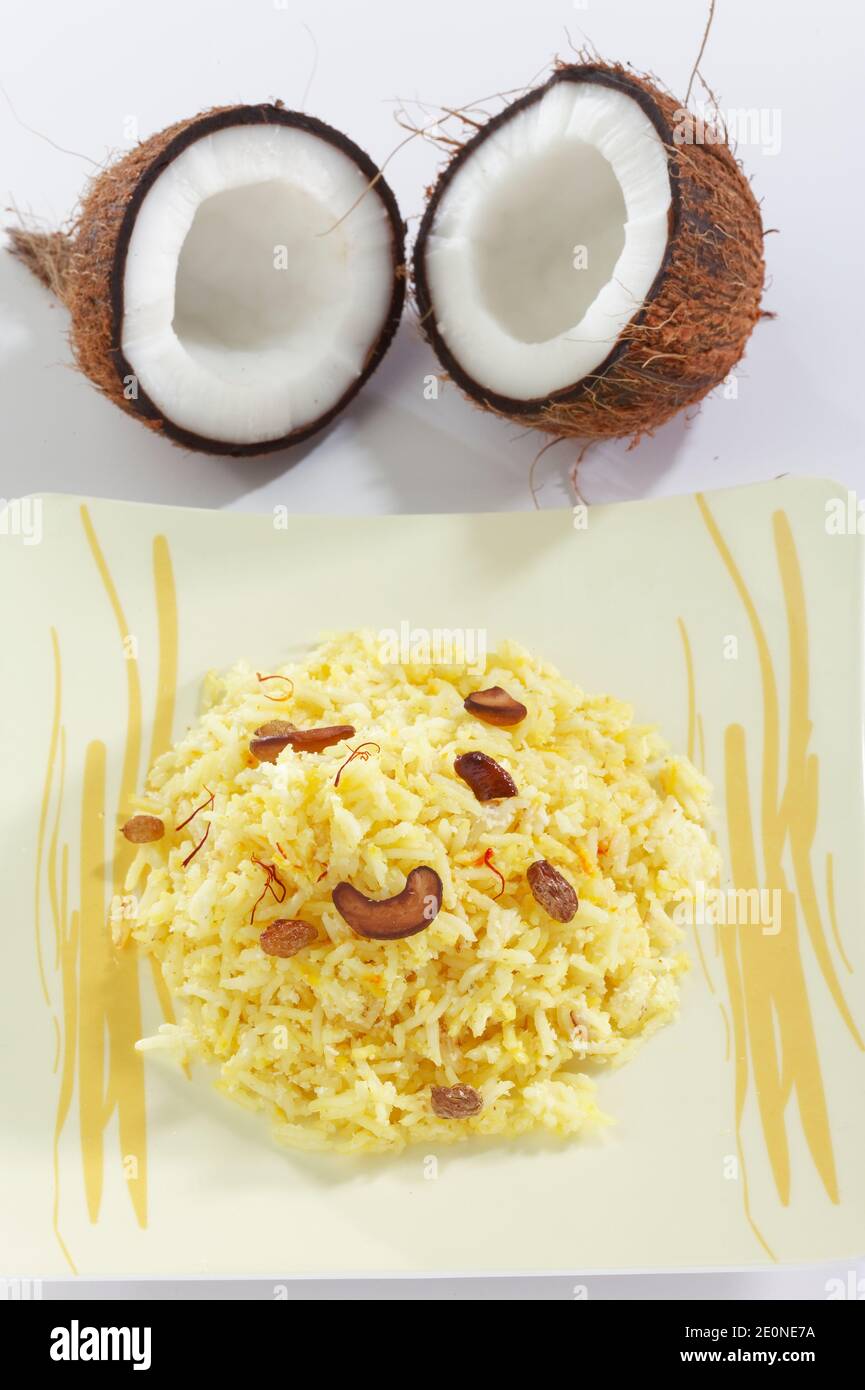 Sweet coconut rice with saffron and dry fruits Stock Photo - Alamy