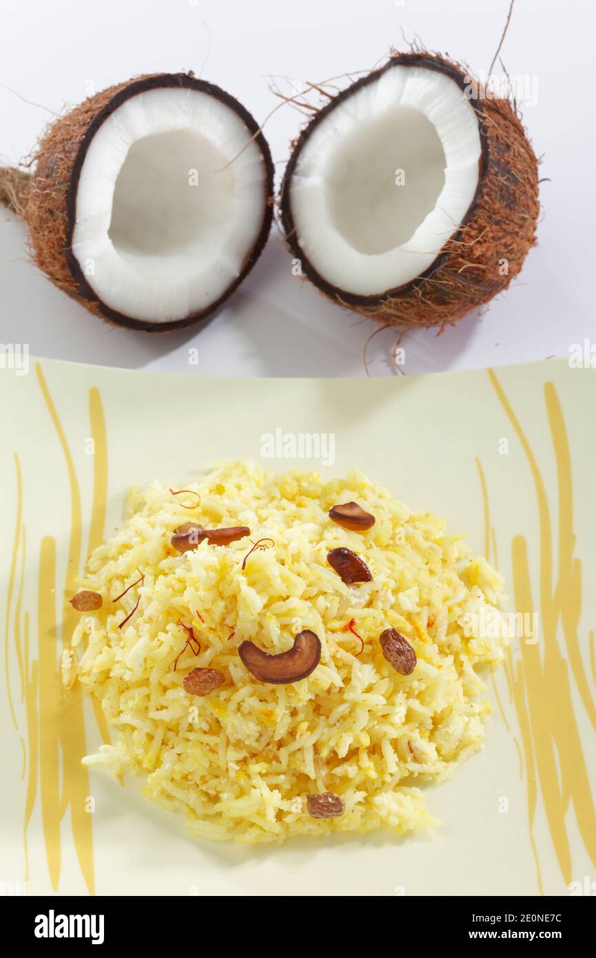 Sweet coconut rice with saffron and dry fruits Stock Photo - Alamy