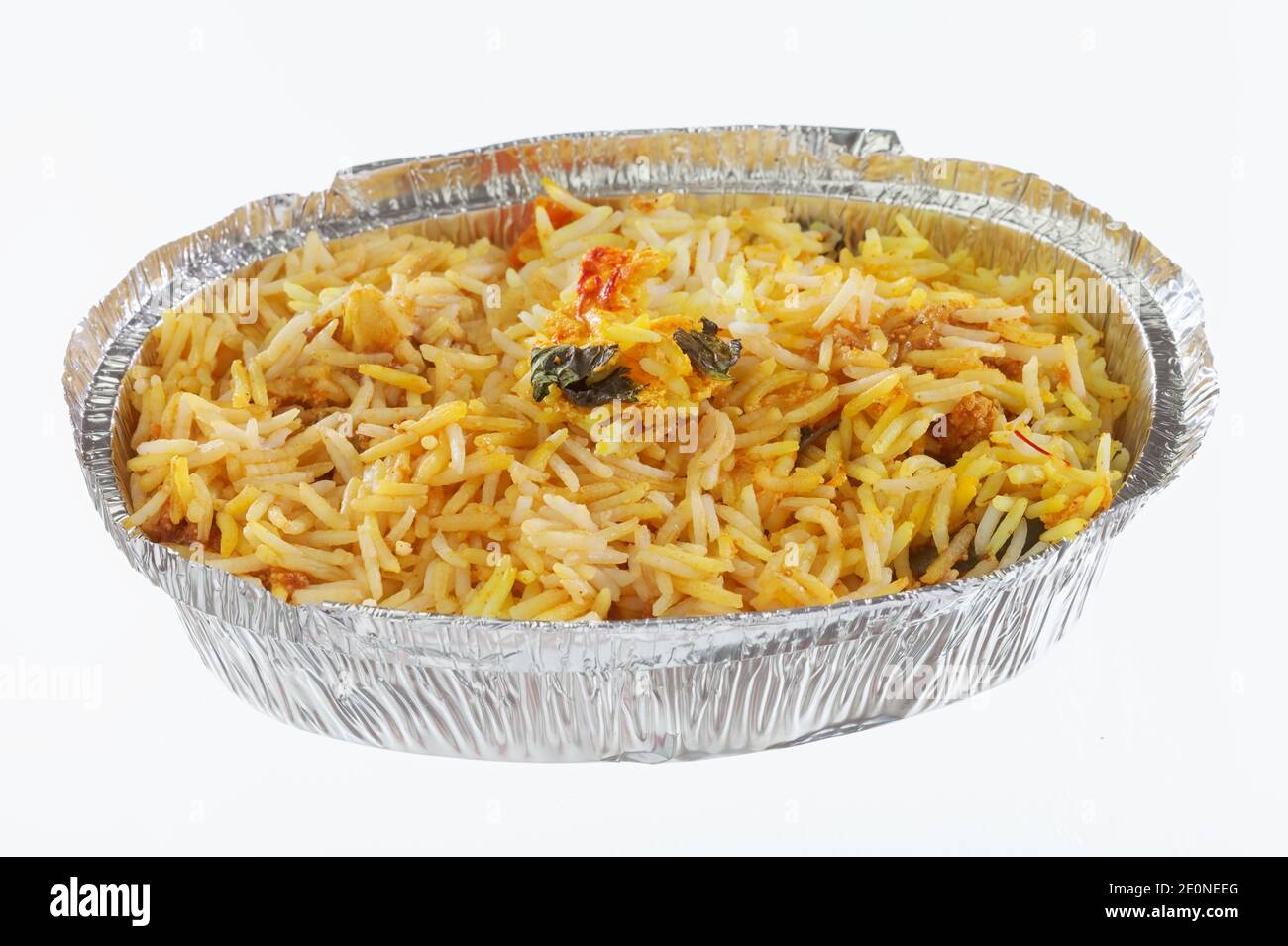 Vegetarian handi biryani with pudina mint leaves and saffron in a metal ...