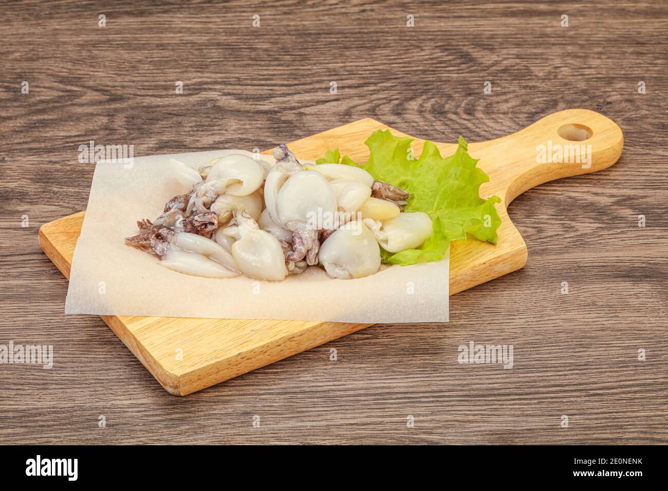 Raw seafood - cuttlefish for cooking over board Stock Photo - Alamy