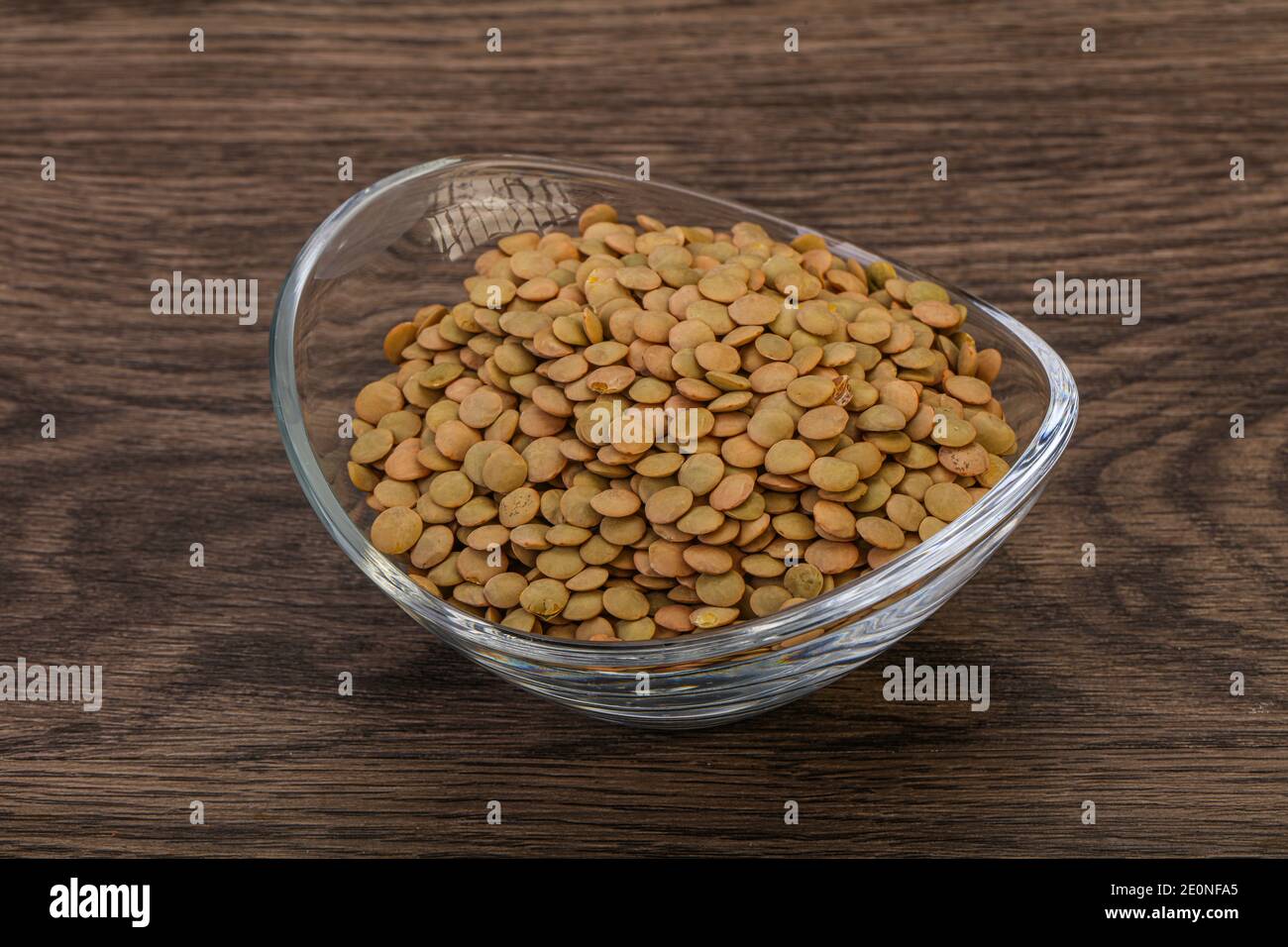 Vegan cuisine - Dry lentil heap isolated Stock Photo - Alamy