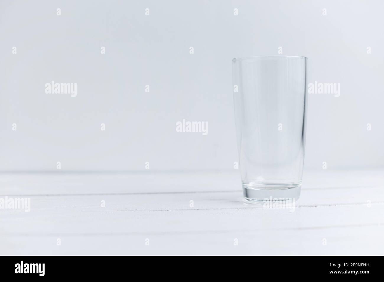 Standing on transparent glass table hi-res stock photography and images ...