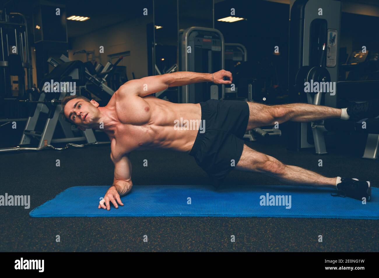 Side plank man hi-res stock photography and images - Alamy
