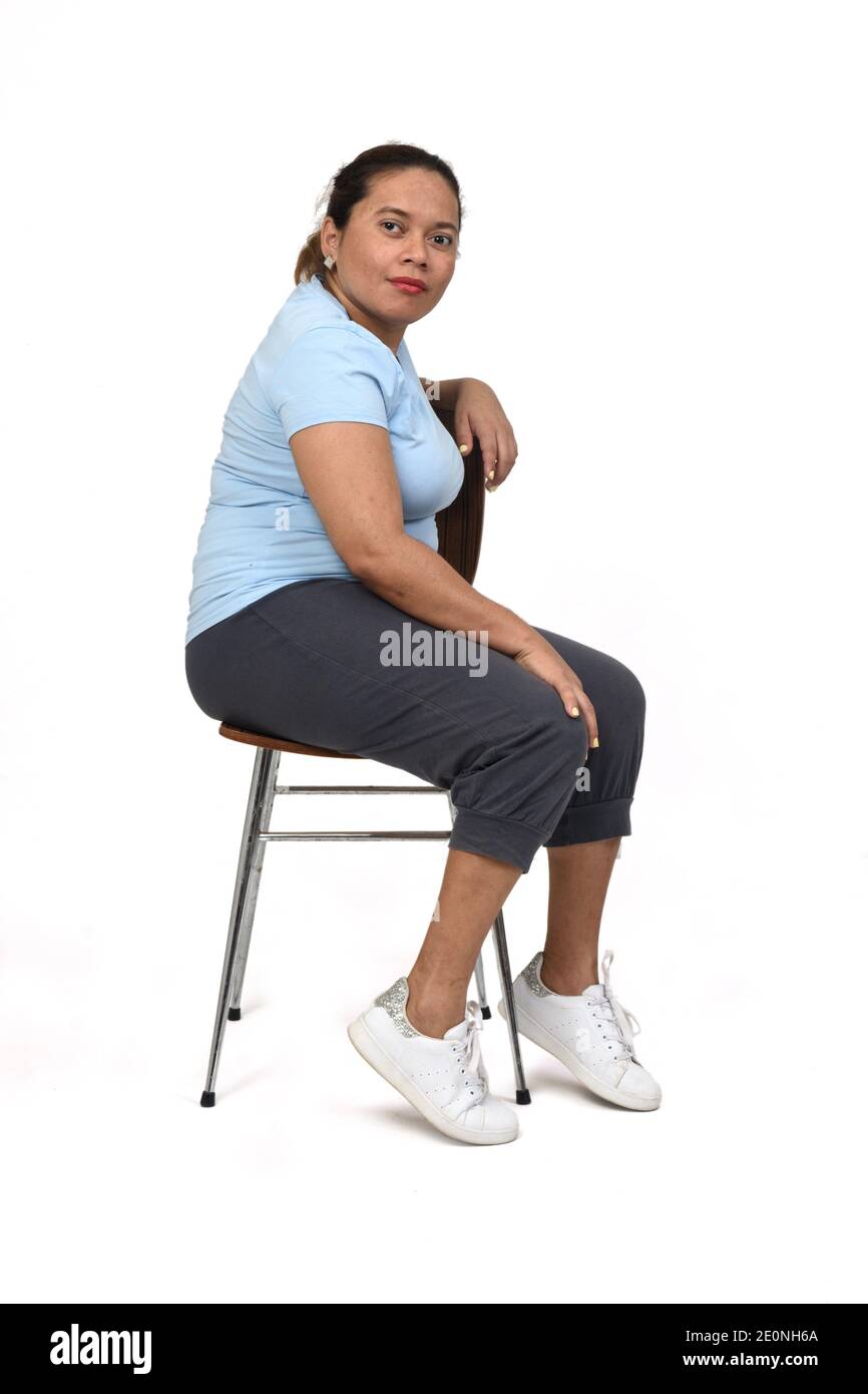 Woman sitting chair side view isolated hi-res stock photography and ...