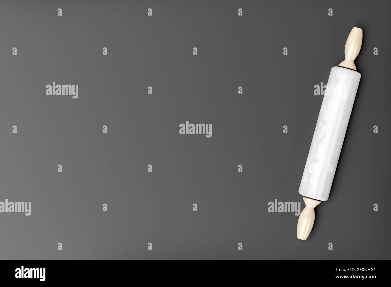 Marble rolling pin on the grey table, top view Stock Photo - Alamy