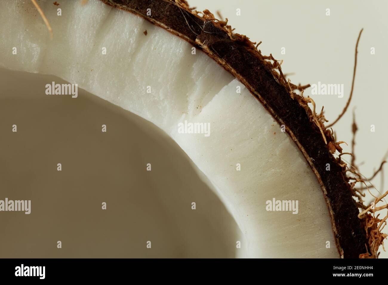 Coconut broken in two parts isolated shot in studio on white background ...