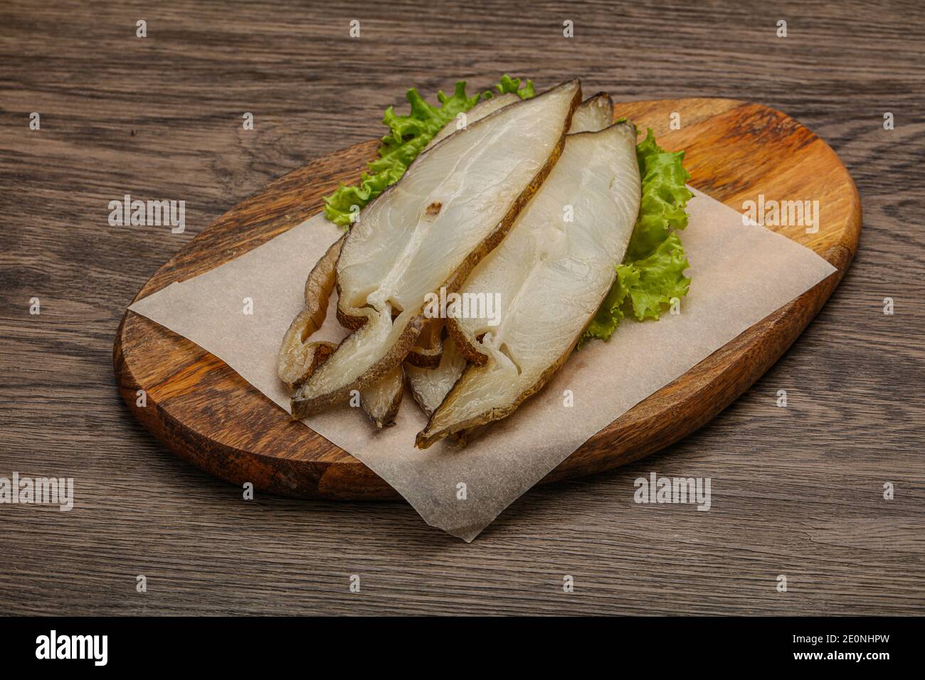 Delicous smoked halibut fish slices snack Stock Photo - Alamy