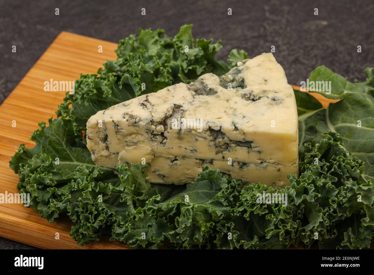 Dairy Blue cheese triangle with mold Stock Photo - Alamy