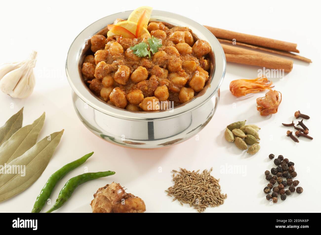 Indian food - chana masala with Indian spices, roti, puri Stock Photo ...