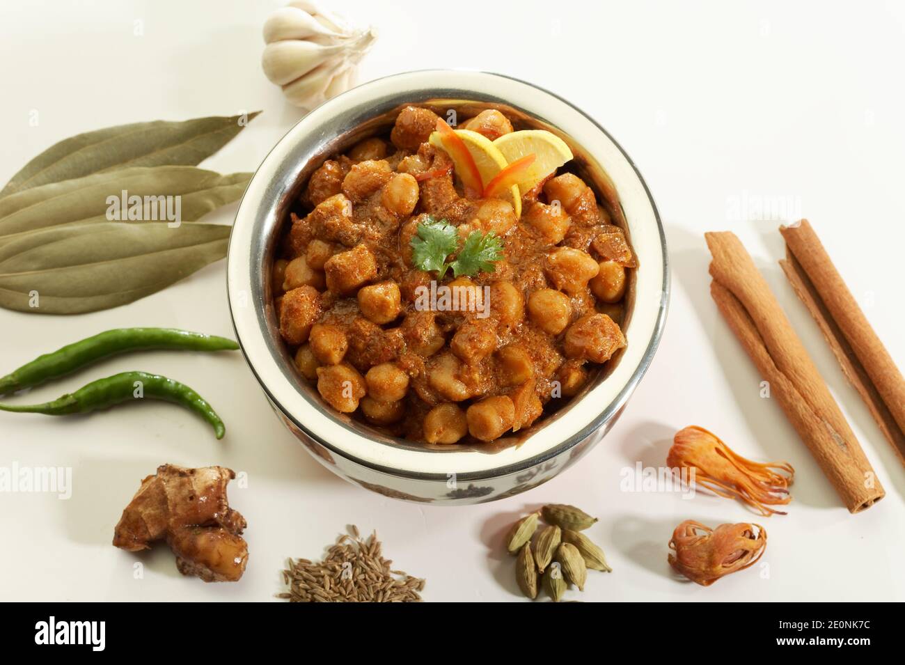 Indian food - chana masala with Indian spices, roti, puri Stock Photo ...