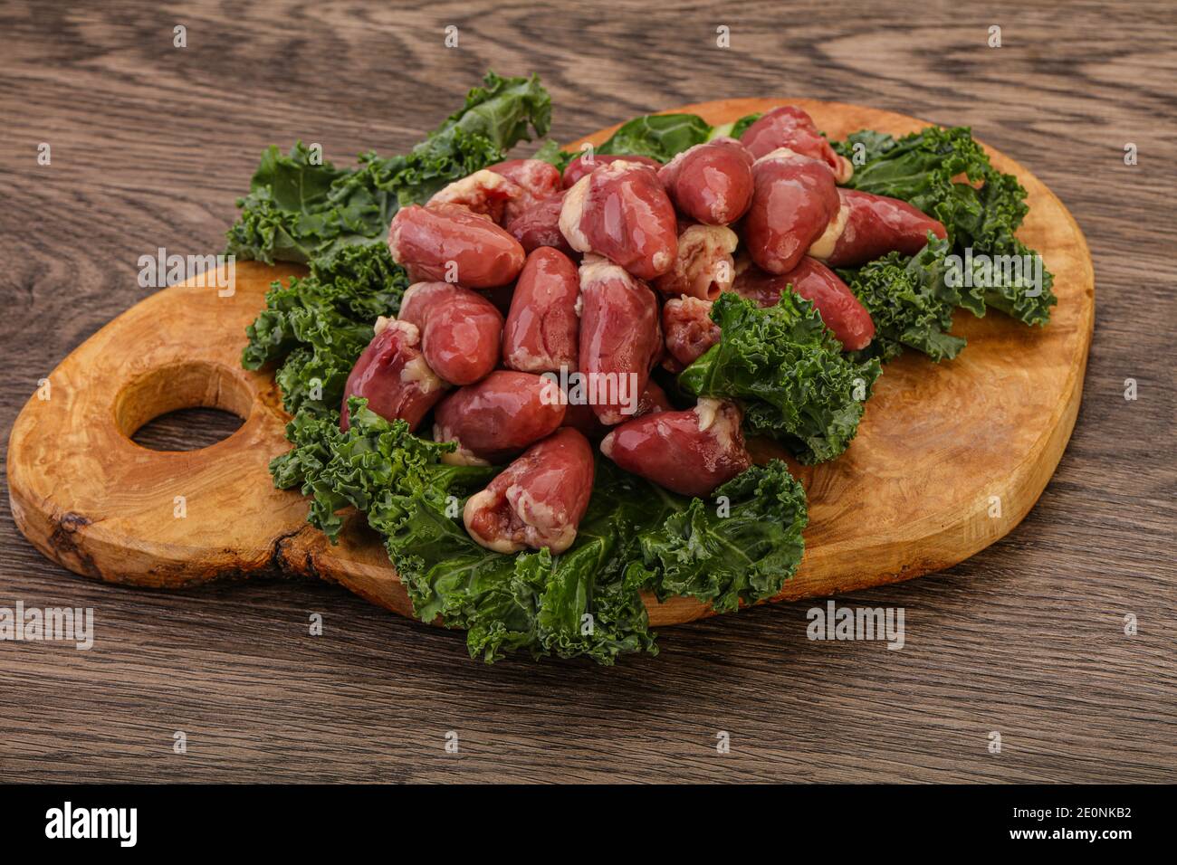 Raw chicken hearts heap for cooking Stock Photo - Alamy